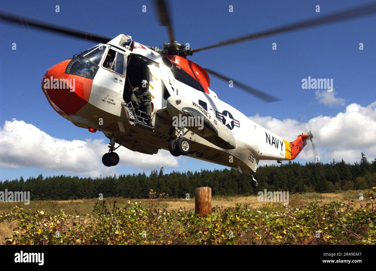 US Navy A UH-3H Sea King helicopter assigned to Fleet Logistics Search ...