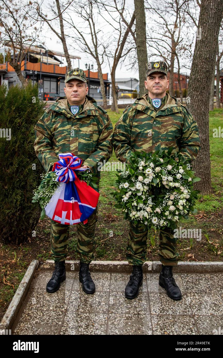 Kosovo Force (KFOR) Soldiers with the Greek Army Honor Guard hold ...