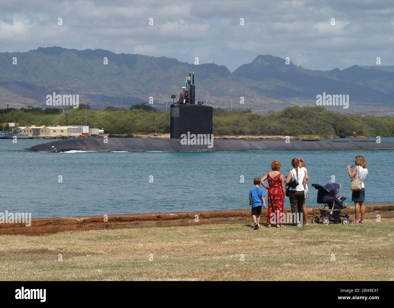US Navy Family members watch as USS Greeneville (SSN 772) departed on ...