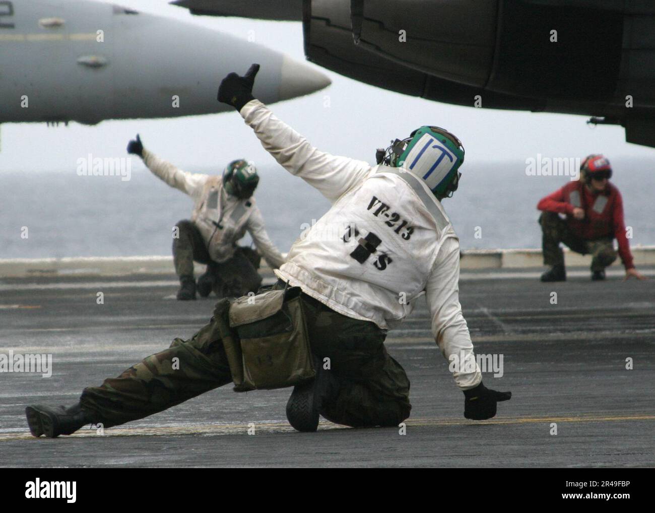 US Navy Troubleshooters assigned to the Black Lions of Fighter Squadron ...