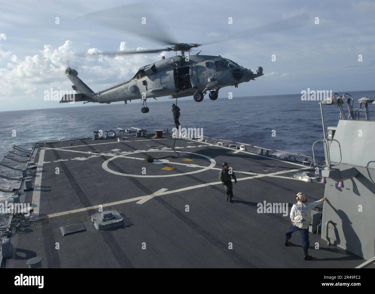 US Navy Members of Explosive Ordnance Disposal Mobile Unit Two perform ...