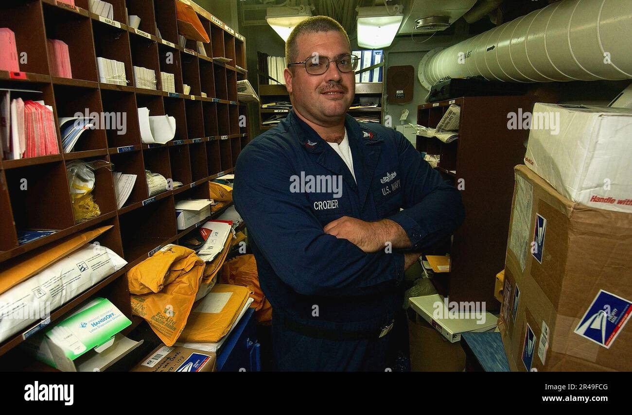 US Navy very busy Postal Clerk Stock Photo - Alamy