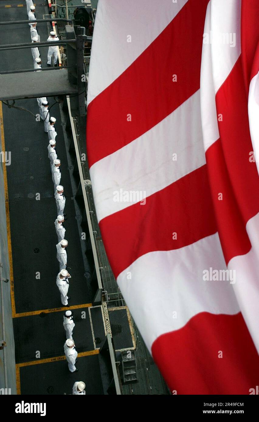 US Navy Sailors man the rails while USS Carl Vinson (CVN 70) arrives at ...