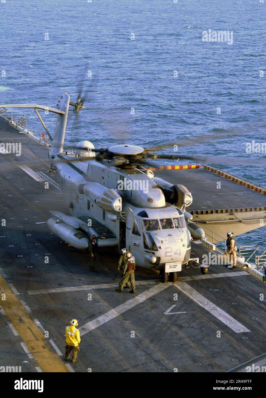 US Navy A CH-53 Sea Stallion lifts off from the flight deck of USS ...