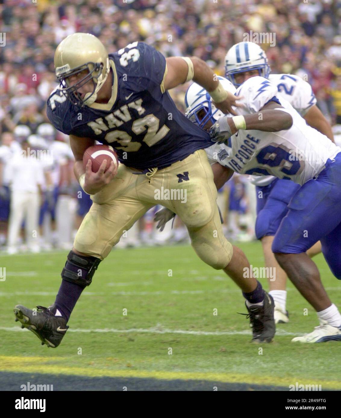 US Navy Navy fullback Kyle Eckel outpaces Air Force free safety Larry ...