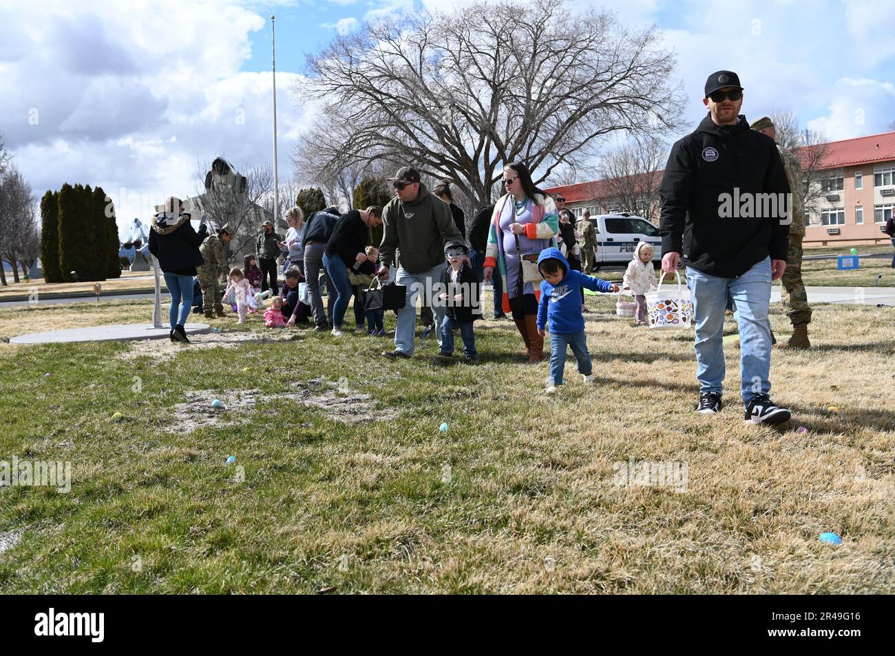Children run into the field in search of candy filled eggs during the ...
