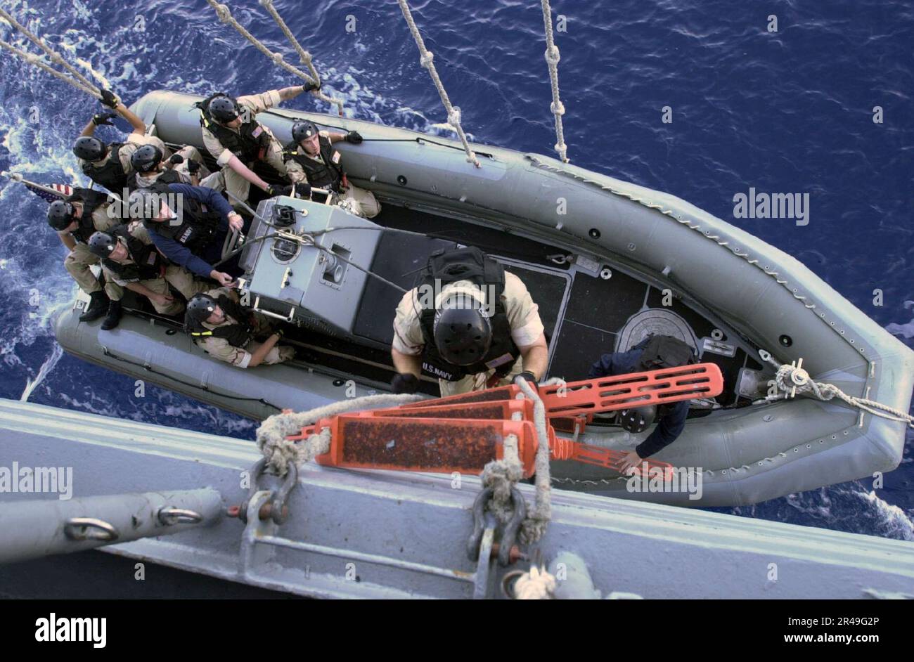 US Navy A boarding team assigned to USS Nicholas (FFG 47) departs to ...
