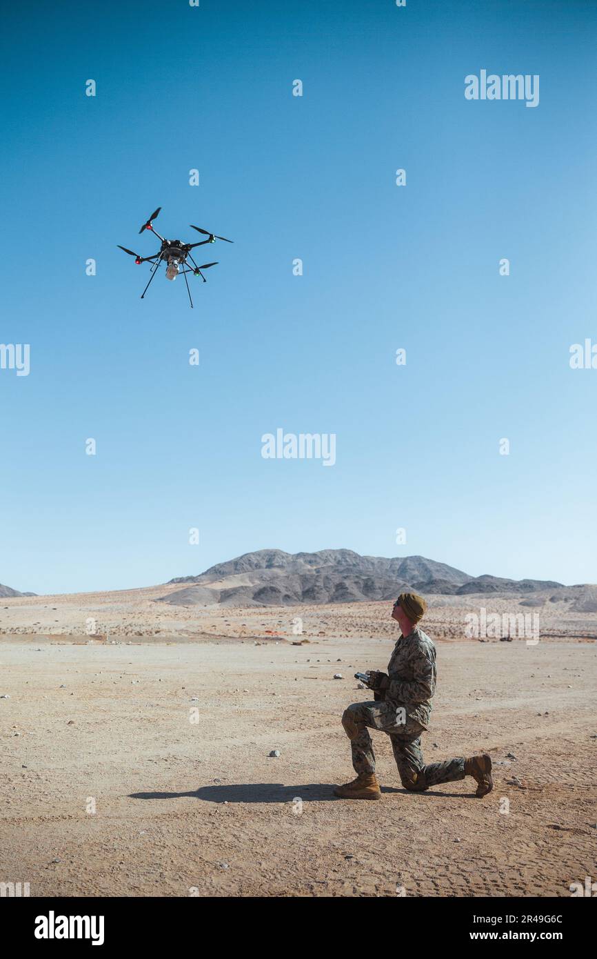 A U.S. Marine with 3d Littoral Combat Team, 3d Marine Littoral Regiment ...