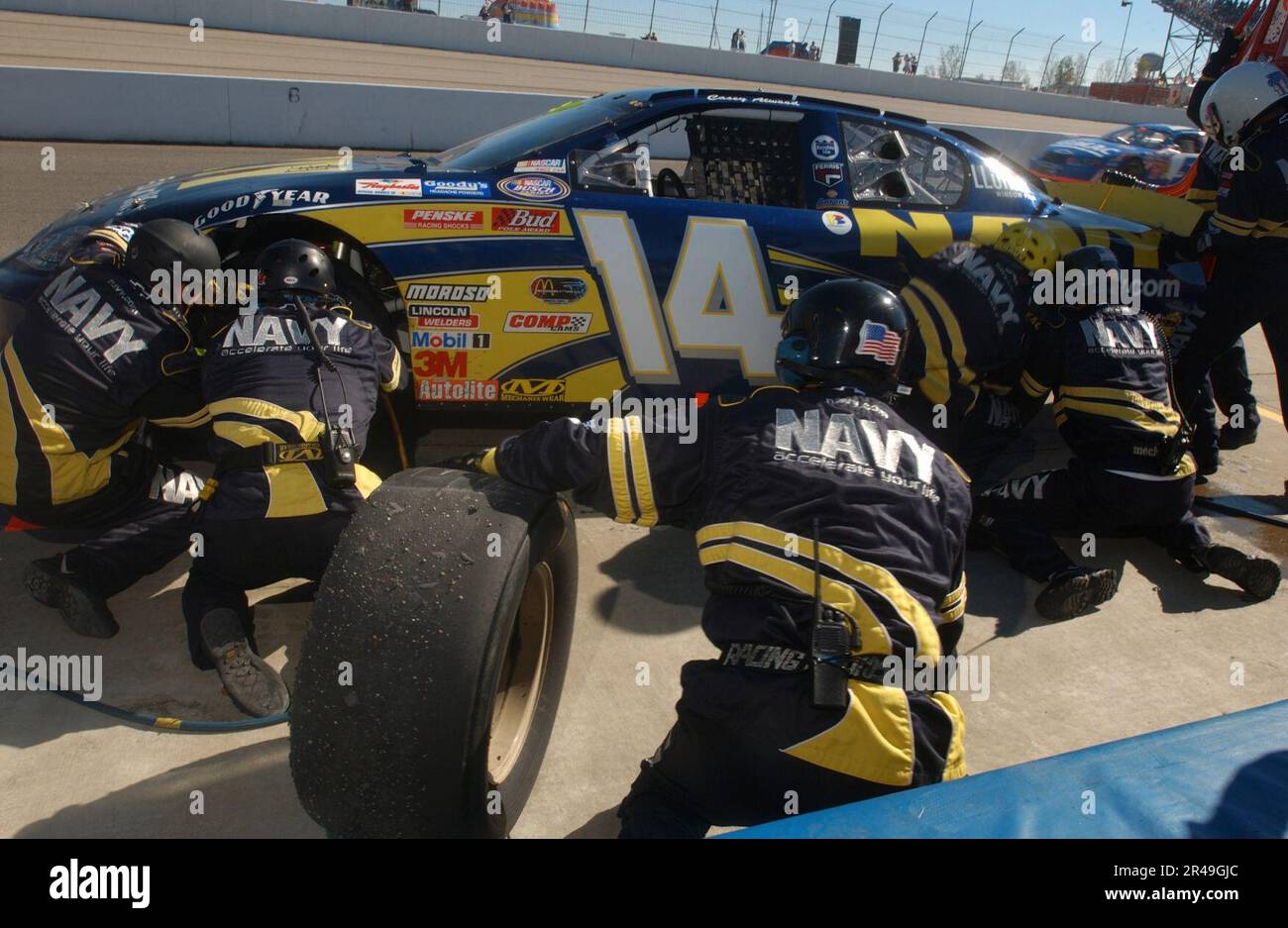 US Navy Members of the Navy NASCAR Busch Series Racing Team pit crew ...