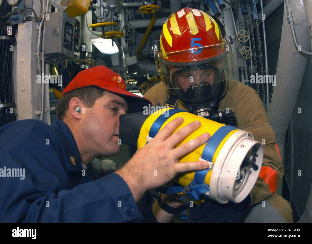 US Navy Sailors are training on how to use the Naval Firefighting ...