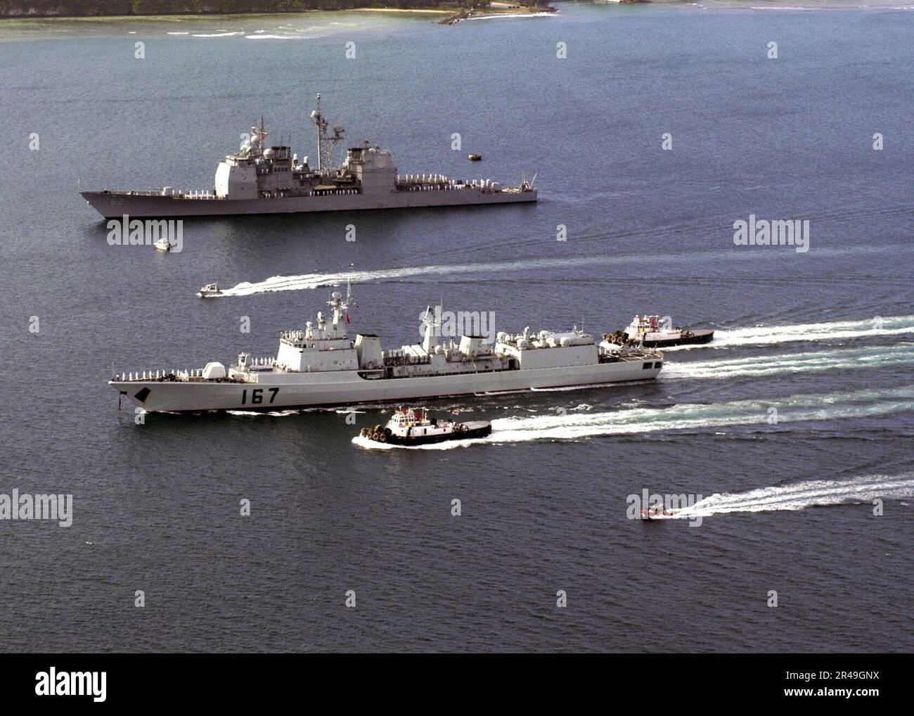 US Navy The guided missile cruiser USS Chancellorsville (CG 62) leads ...
