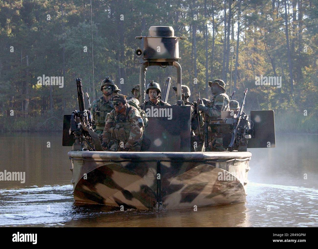 US Navy Members of Special Boat Team Two Two (SBT-22) practice narrow ...