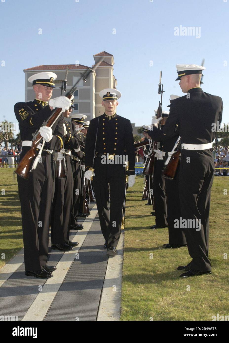 US Navy Members of the U.S. Naval Academy Silent Drill Team perform at ...