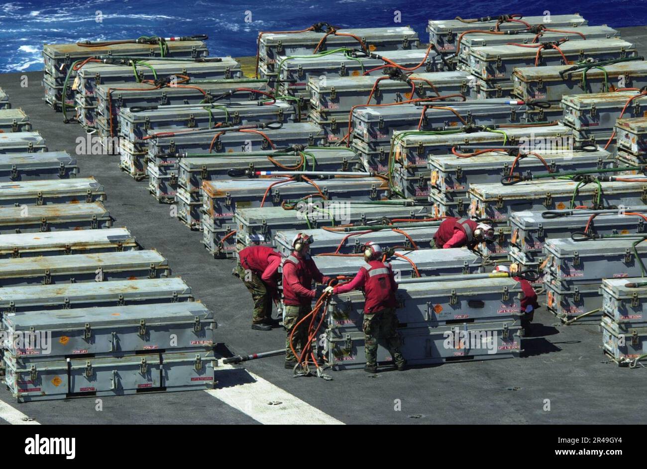 US Navy During an ammunition offload, Aviation Ordnanceman prepare ...