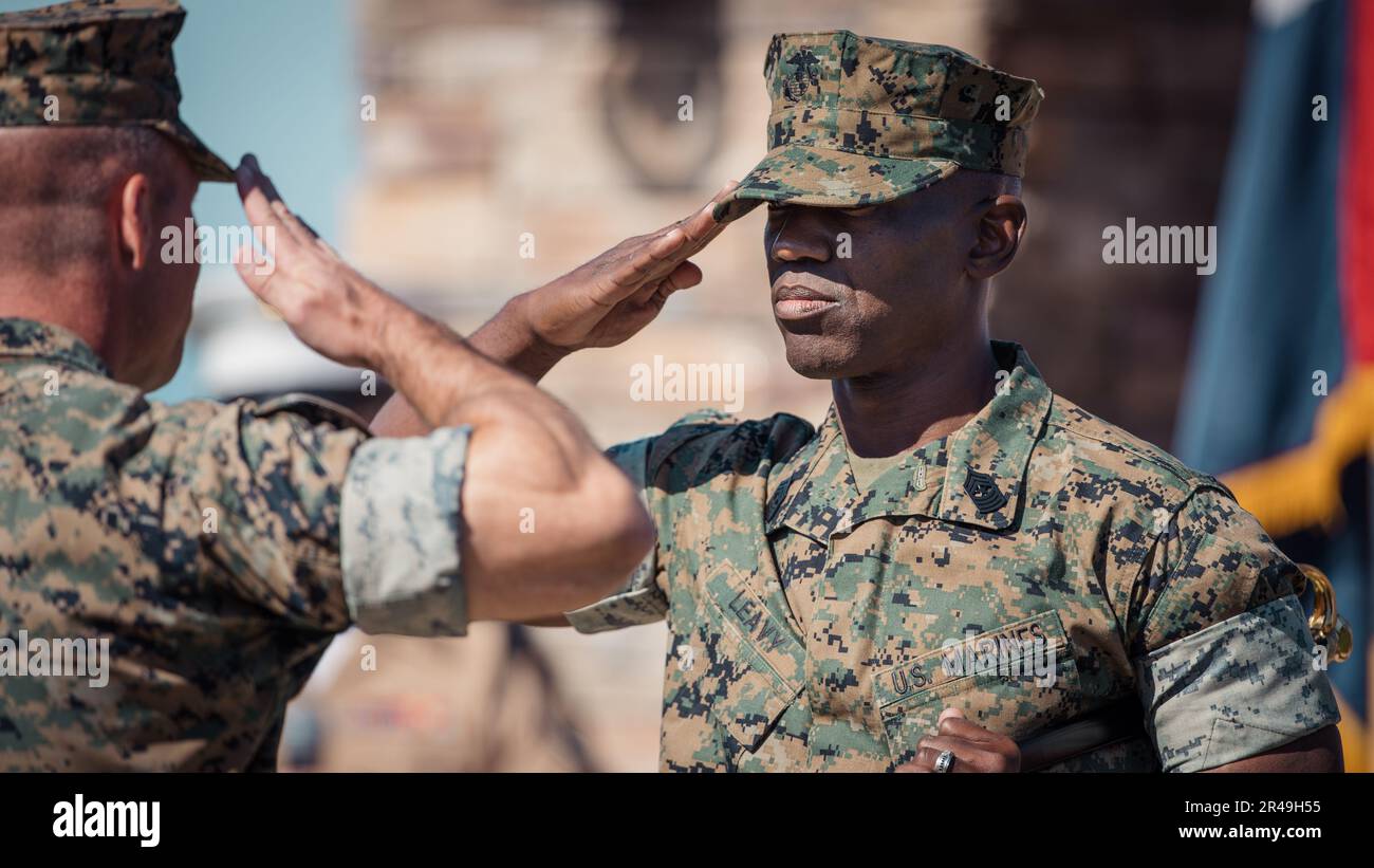 U.S. Marine Corps Sgt. Maj. Oranjel Leavy, right, the outgoing sergeant ...