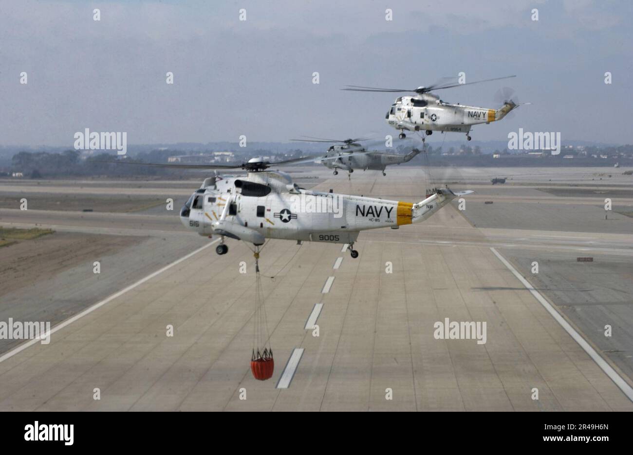 US Navy UH-3H Sea King helicopters assigned to the Golden Gaters of Helicopter Combat Support ...