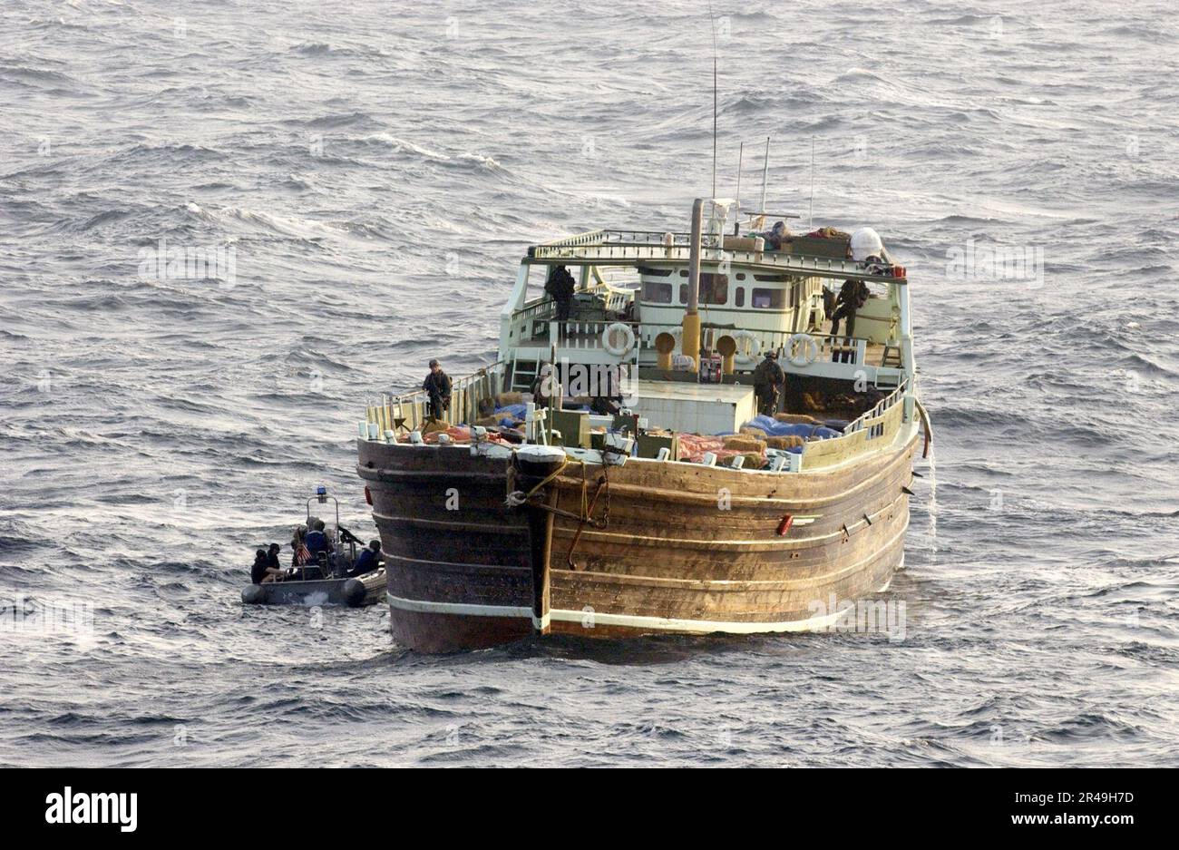 US Navy Visit Board Search and Seizer (VBSS) teams, supported by the ...
