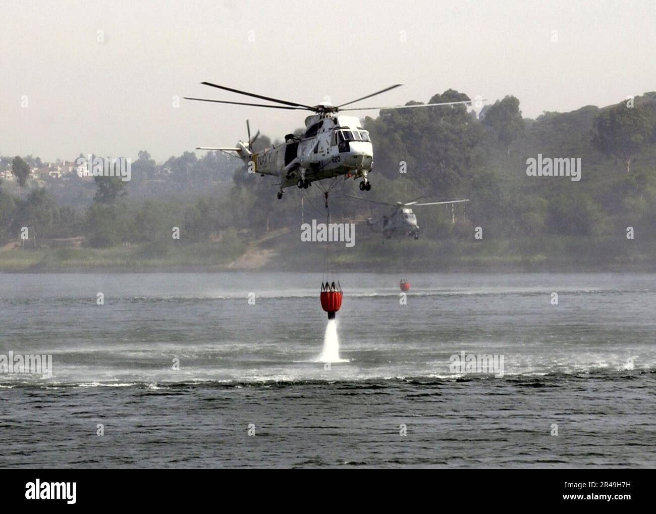 US Navy Two UH-3H Sea King helicopters assigned to the Golden Gaters of ...