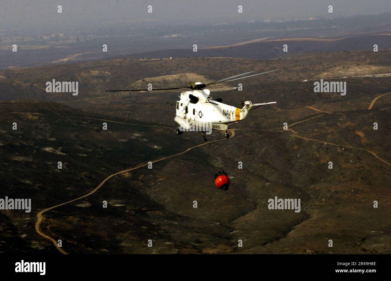 US Navy An UH-3H Sea King helicopter assigned to the Golden Gaters of ...