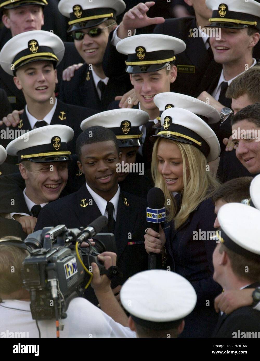 US Navy HDNet broadcaster Kandace Krueger (center right) interviews ...