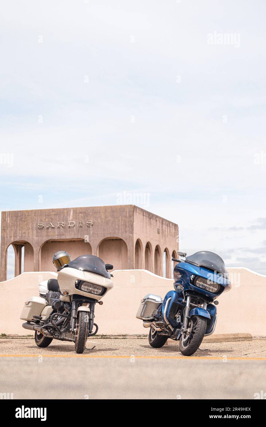 Two motorcycles parked side-by-side on a rural road Stock Photo - Alamy