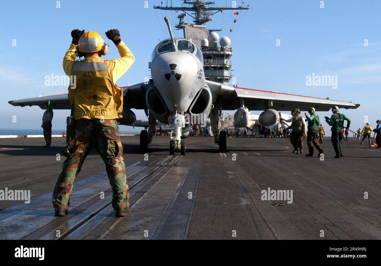 US Navy An aircraft handler directs an EA-6B Prowler Stock Photo - Alamy