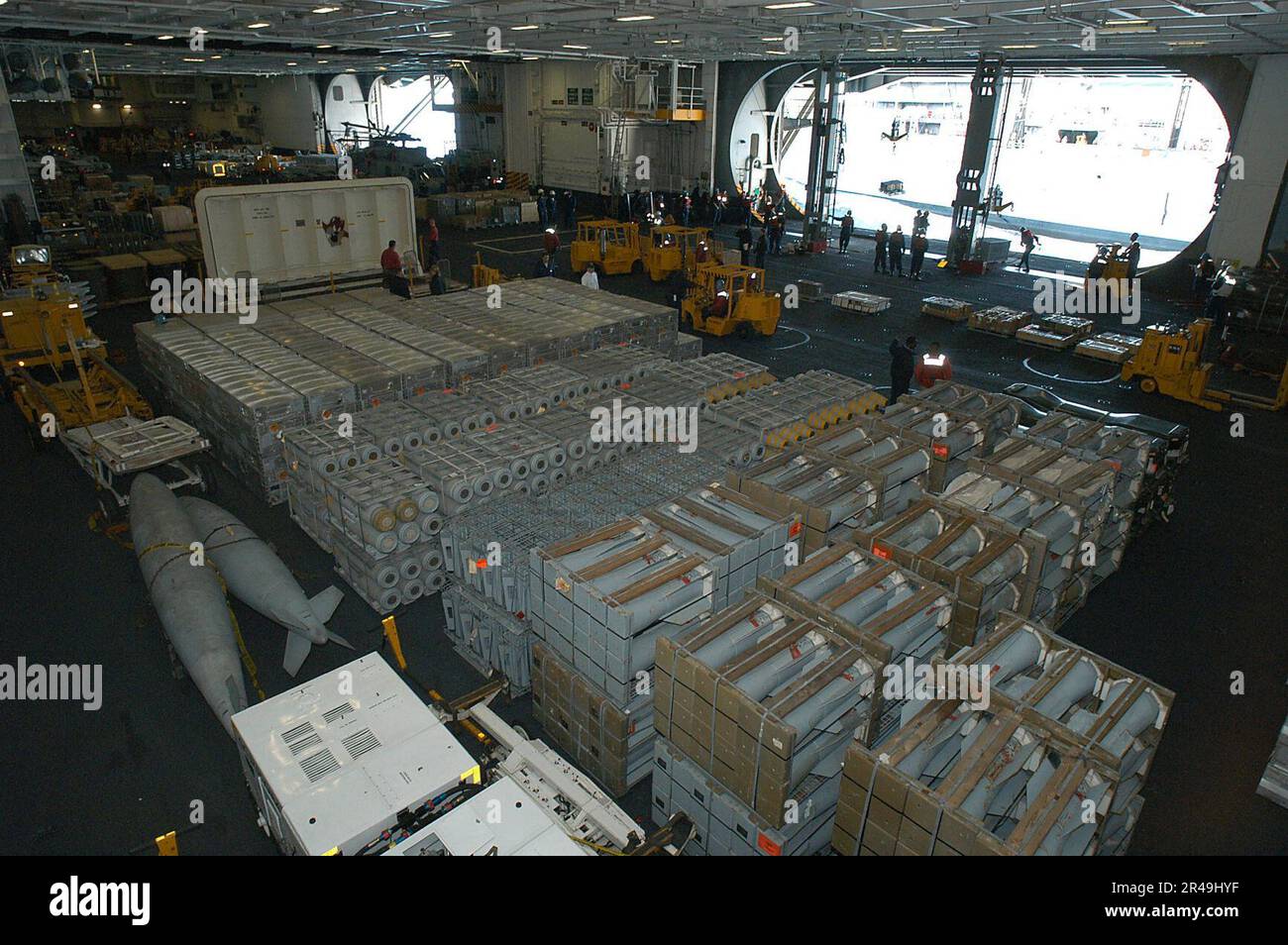 US Navy The hangar bay aboard the nuclear powered air craft carrier USS ...