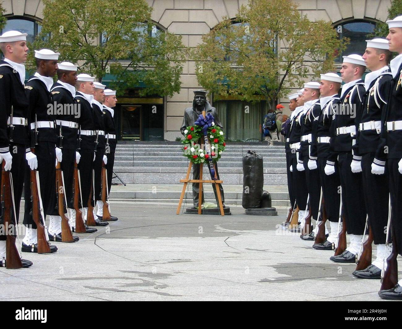 US Navy Sailors assigned to the U.S. Navys Ceremonial Guard stand in formation in front of the ...