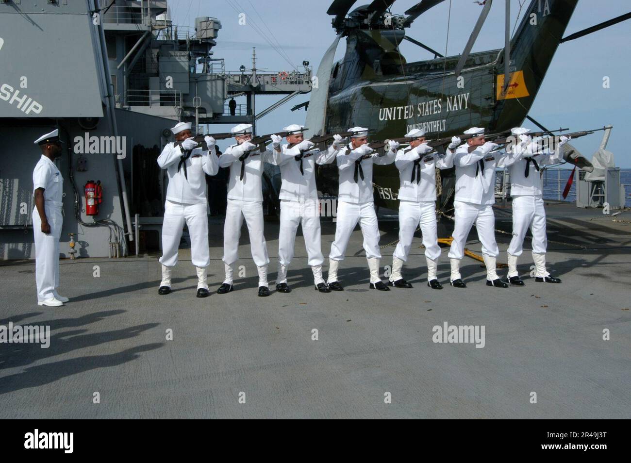 US Navy USS Blue Ridge (LCC 19) ceremonial rifle honor guard fires a 21 ...