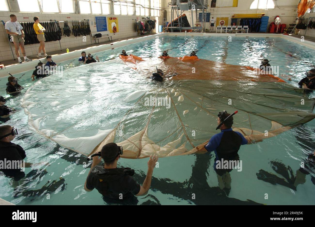 US Navy Students at the Aviation Rescue Swimmer School prepare to ...