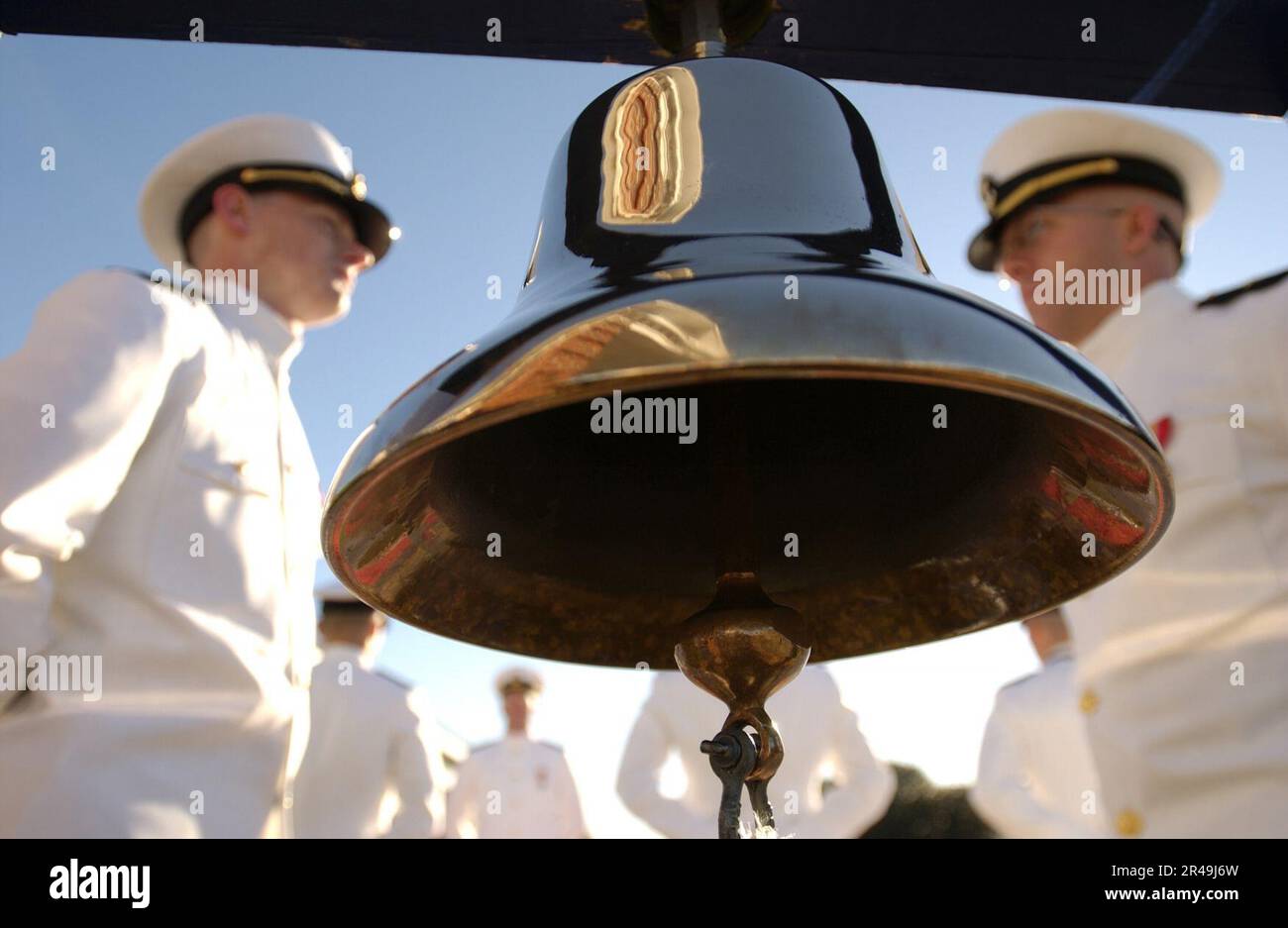 US Navy Junior class officer candidates stand next to the ceremonial ...