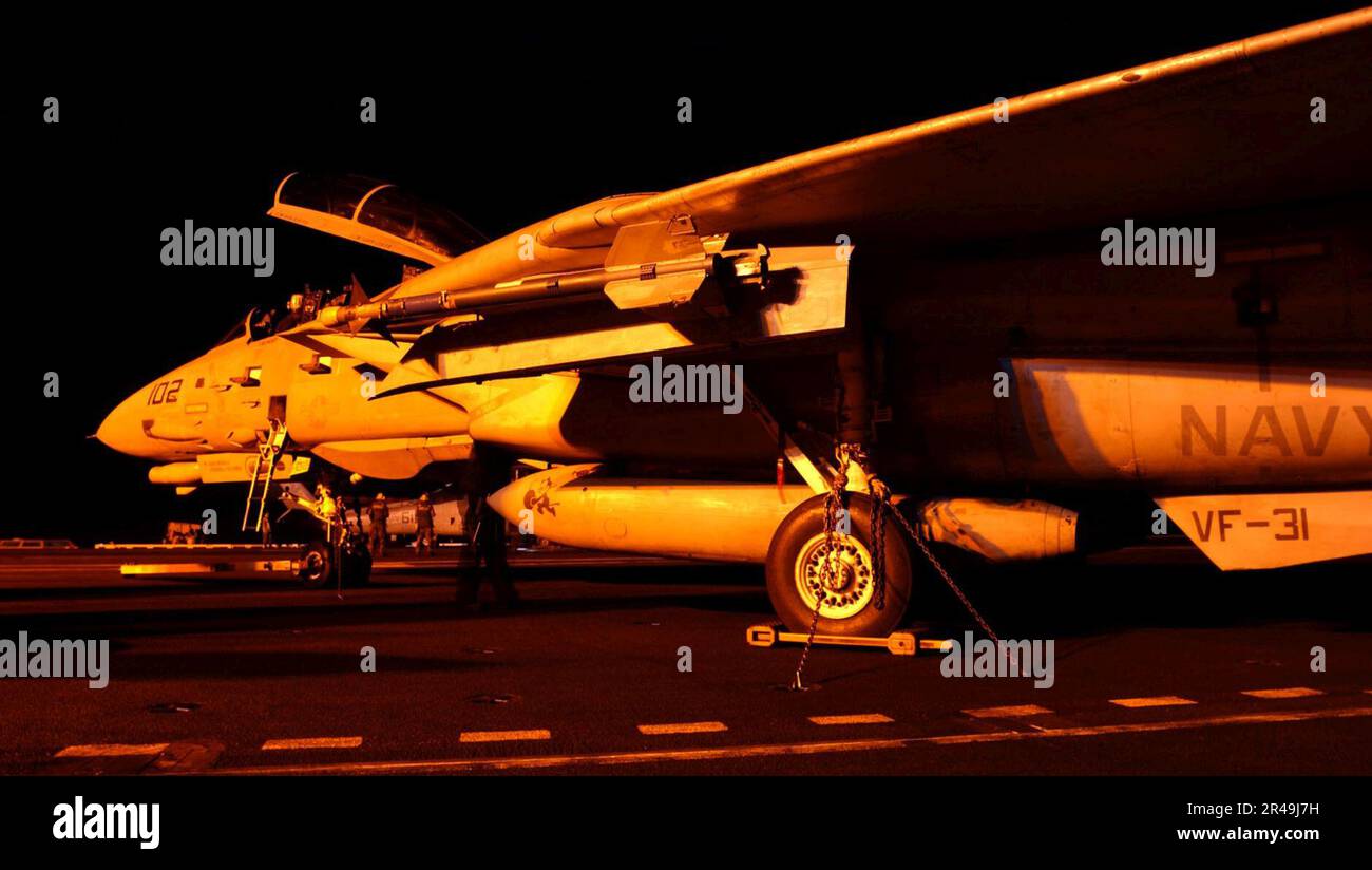 US Navy An F-14D Tomcat is readied for night flight operations Stock ...