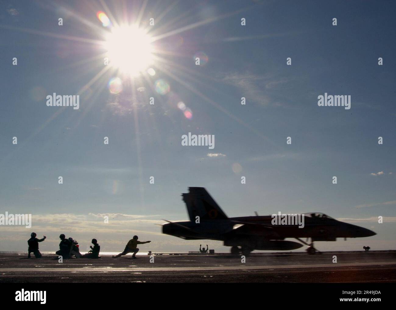 US Navy An F-A-18 Hornet assigned to the Gunslingers of Strike Fighter ...