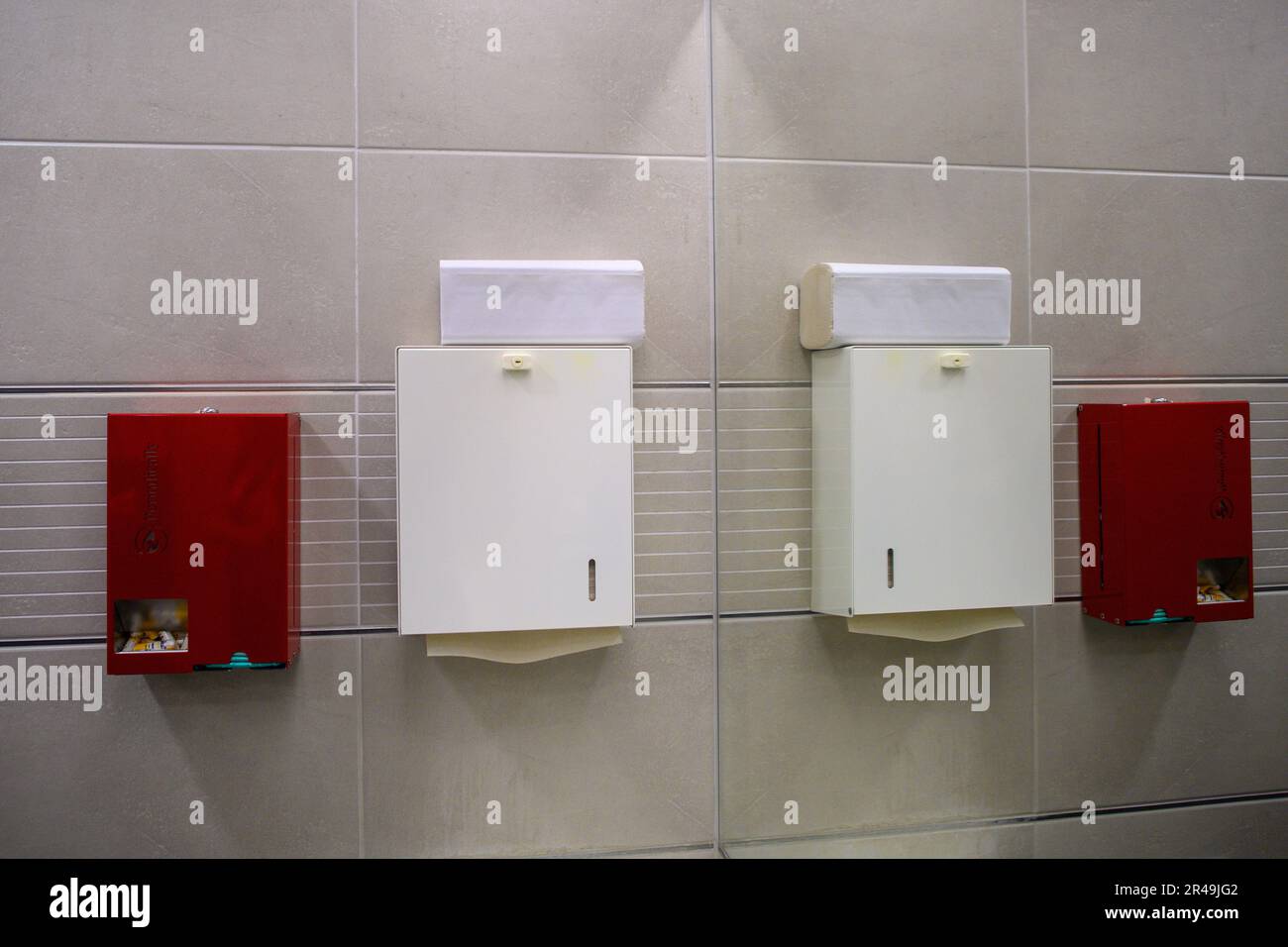 Magdeburg, Germany. 17th May, 2023. A tampon and pad dispenser (l) from ...