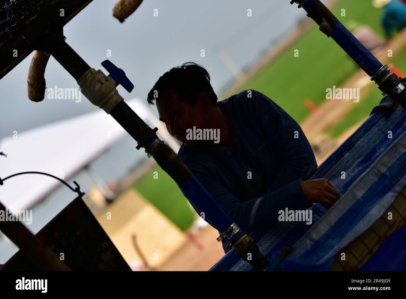 U.S. Navy Petty Officer 1st Class Kirtneyshane Lim, working as a ...