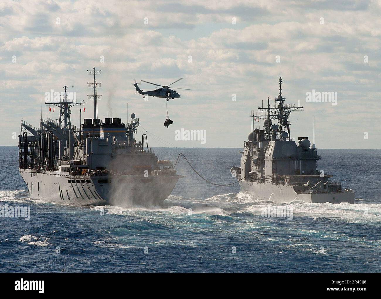 US Navy The Military Sealift Command ship USNS Supply (T-AOE 6) conducts a refueling at sea and ...