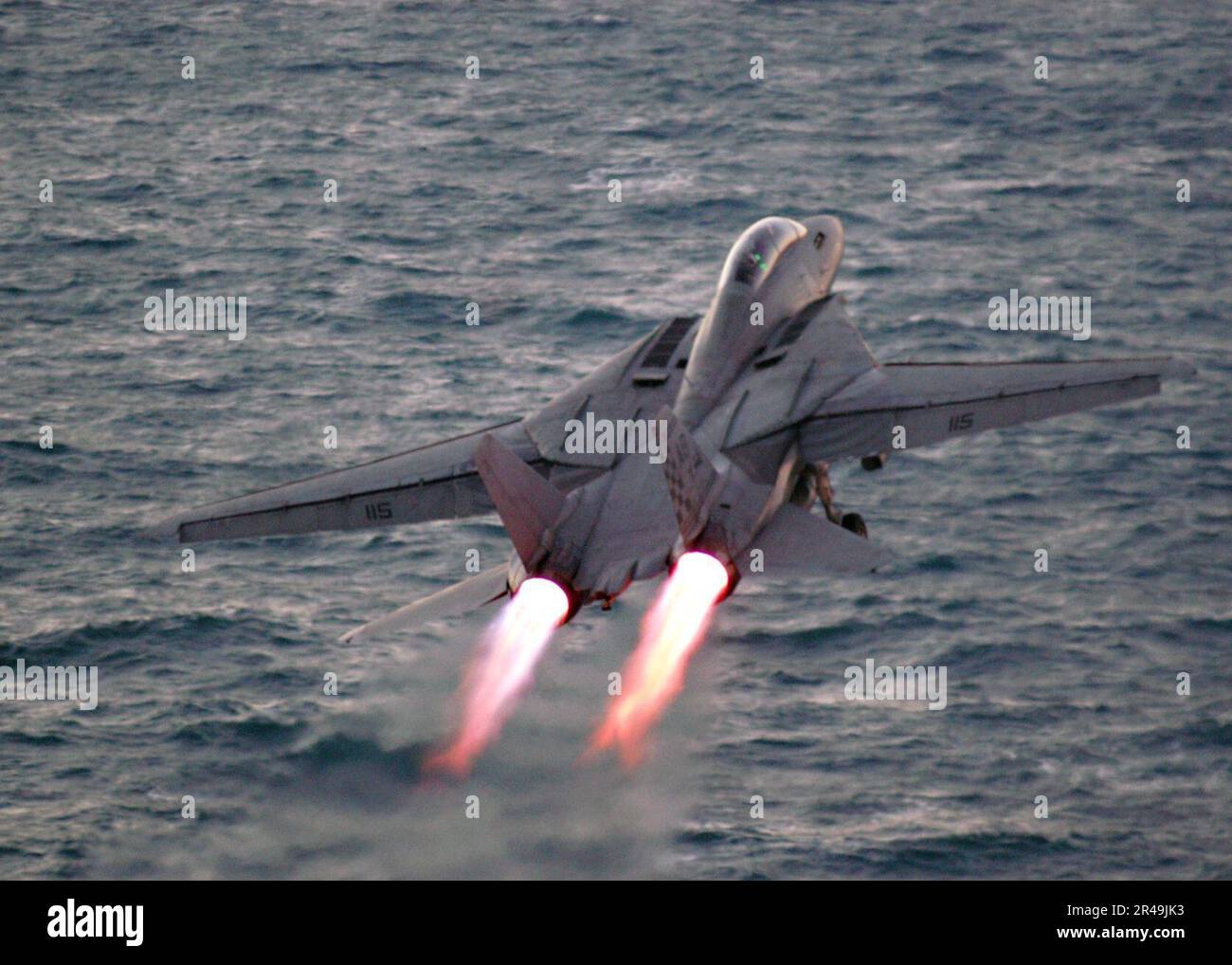 US Navy An F-14 Tomcat assigned to the Checkmates of Fighter Squadron ...