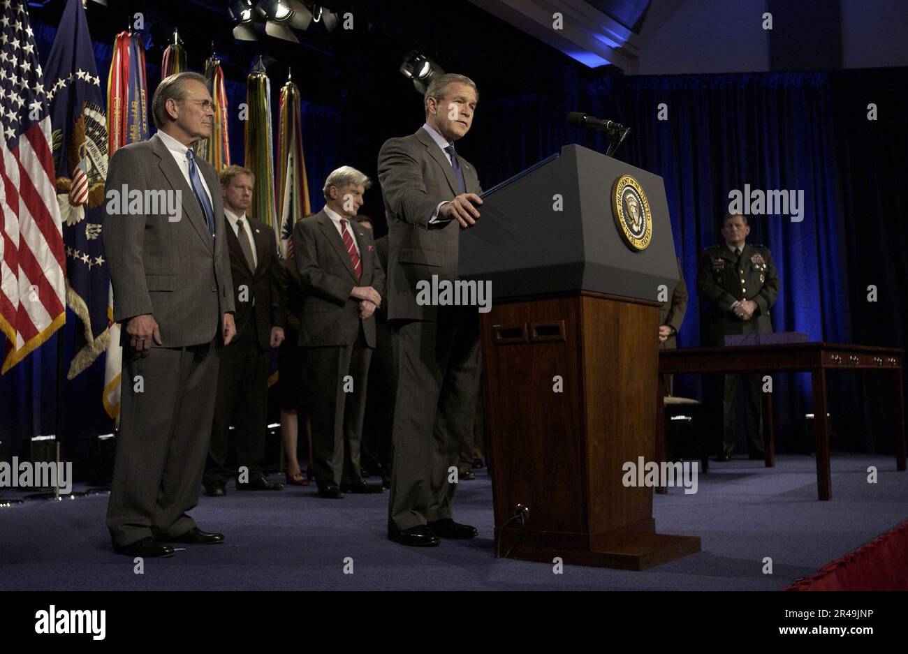 US Navy President George W. Bush speaks to the troops prior to signing ...