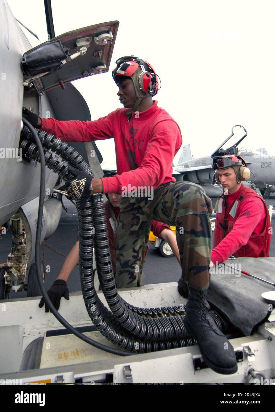 US Navy Sergeant William B. Payne supervises Corporal Stargell ...