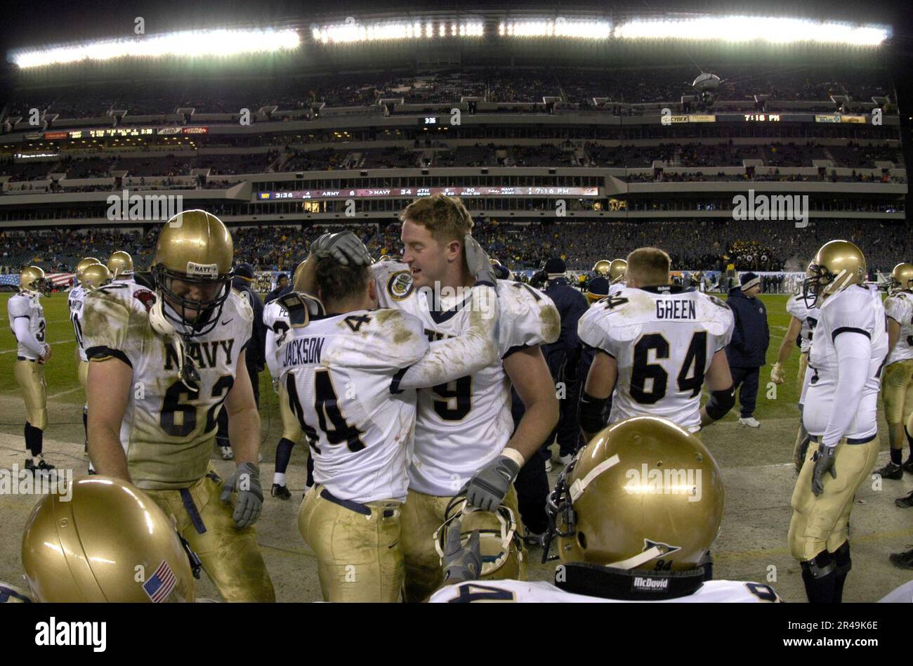 US Navy Navy linebacker (44) and offensive left tackle (79 ...