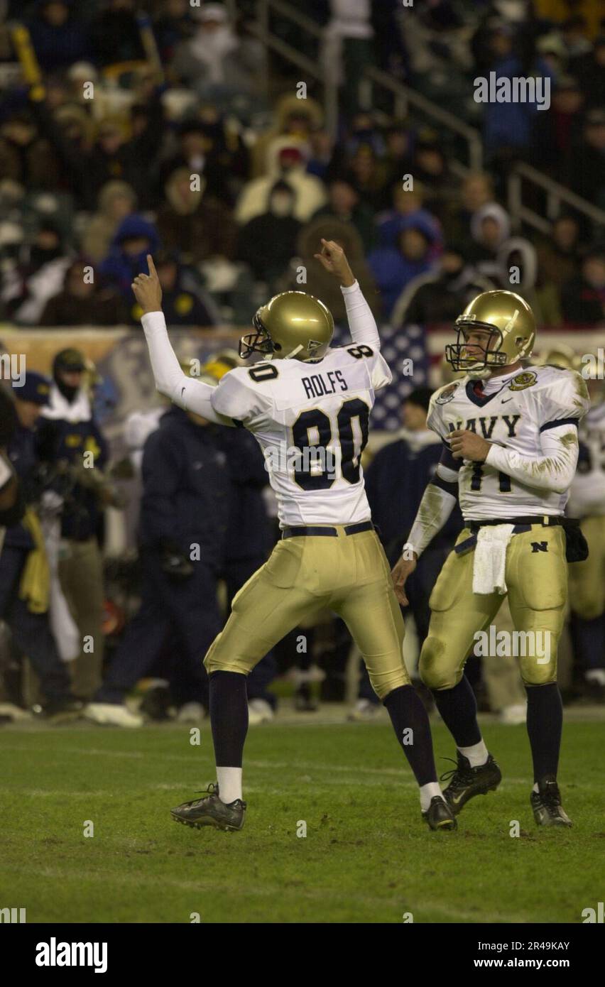 US Navy Navy kicker (80) celebrates a field goal with quarterback ...