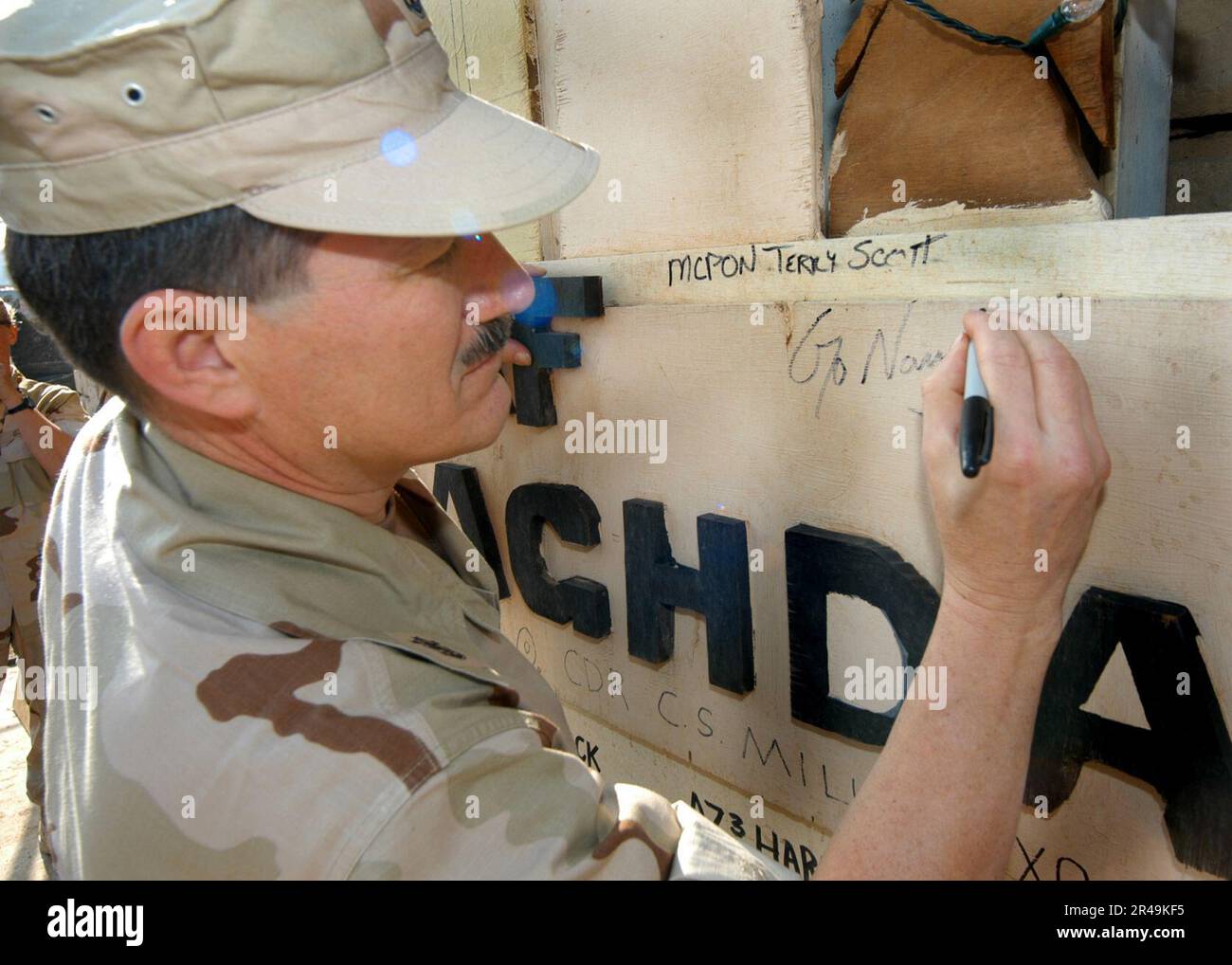 US Navy Master Chief Petty Officer of the Navy (MCPON) Terry Scott adds ...