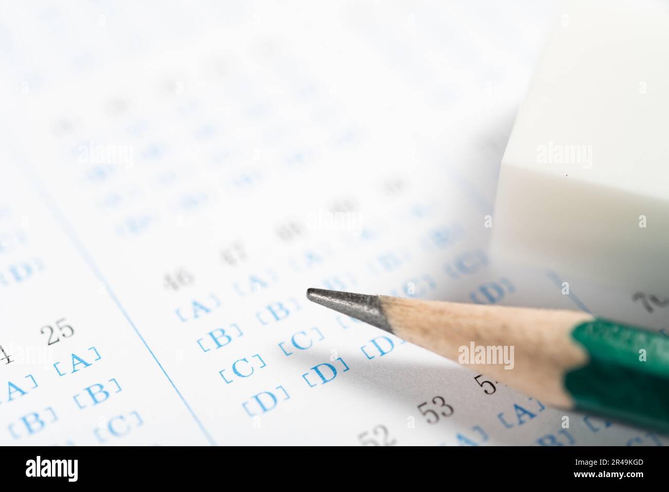angle view test score sheet and pencil and eraser close up horizontal ...