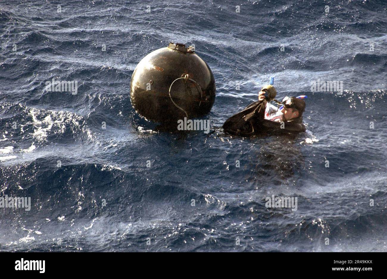 US Navy Gunners Mate 1st Class assigned to Explosive Ordnance Disposal ...