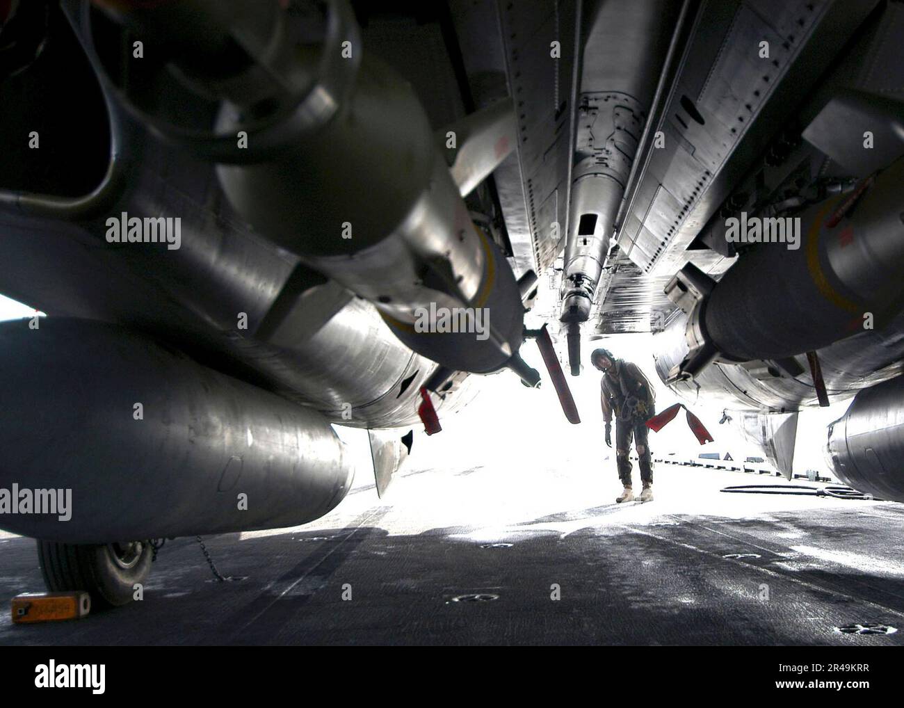 US Navy A naval aviator completes aircraft checks for a F-14A Tomcat ...