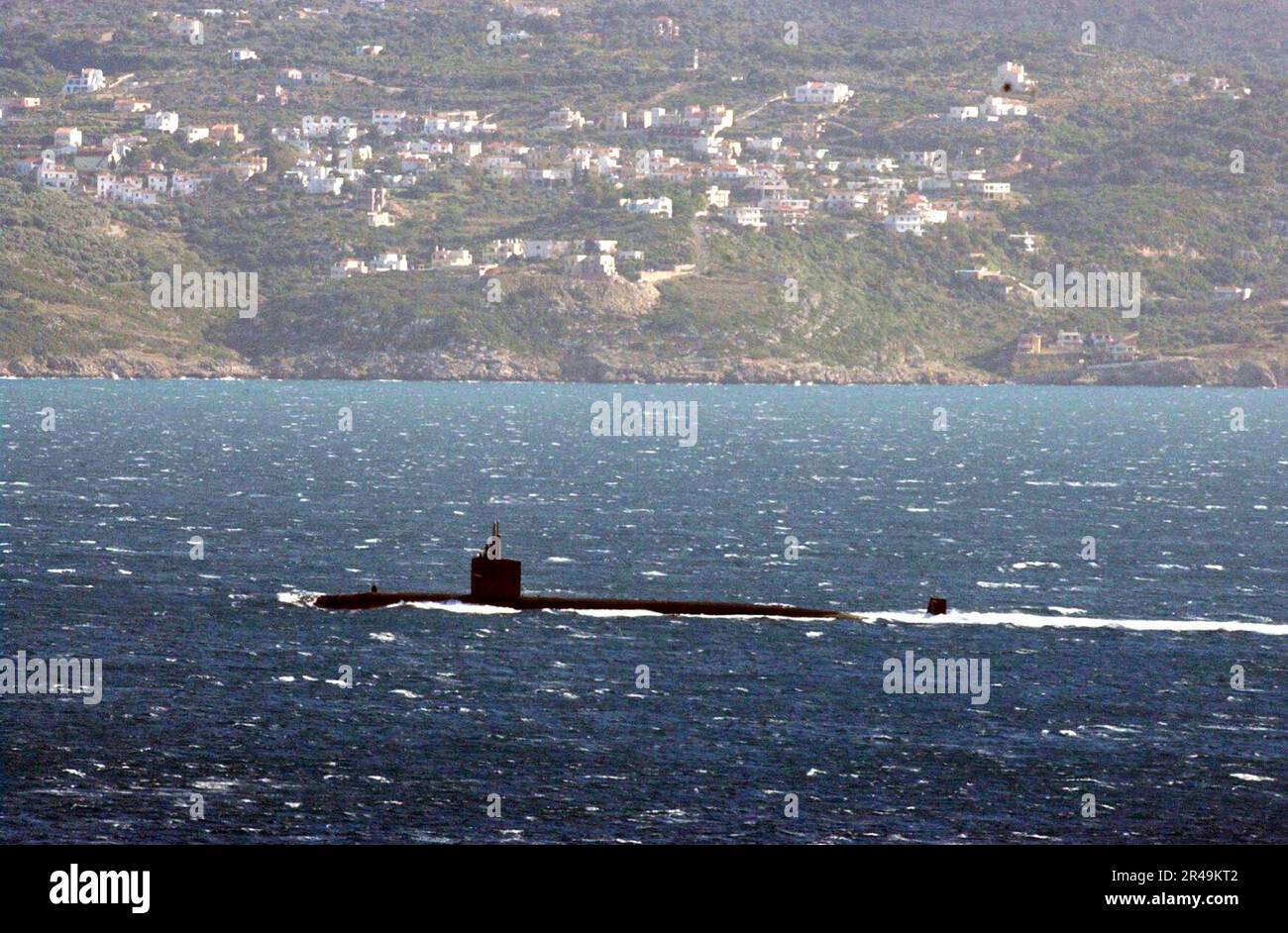 US Navy USS Memphis (SSN 691) heads out to sea following a brief stop ...