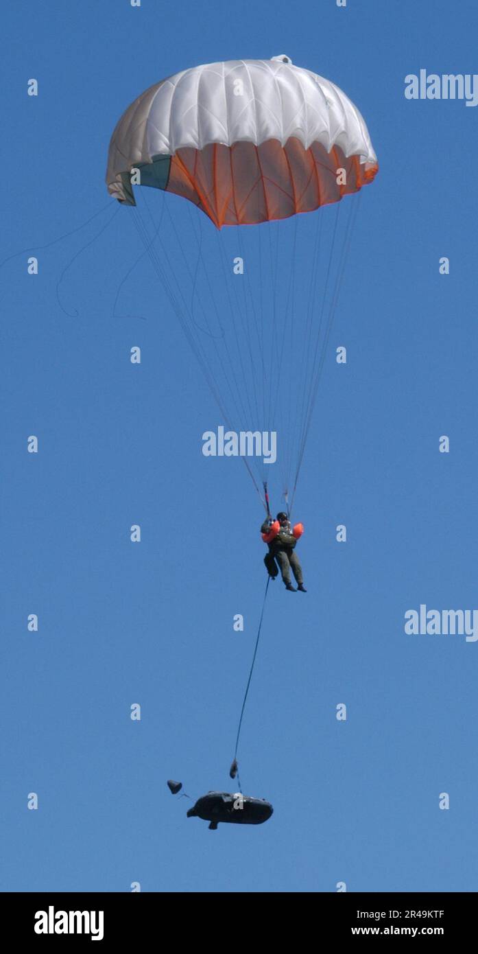 US Navy An Air Force Staff Sgt. assigned to Air Force Water Survival ...