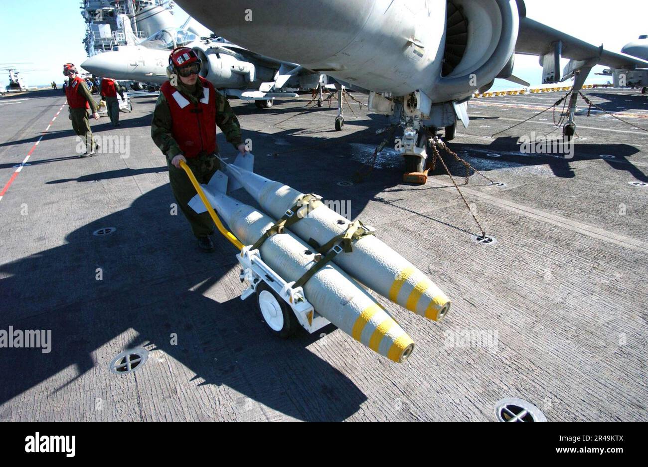 US Navy A sailor aboard the amphibious assault ship USS Wasp transports ...
