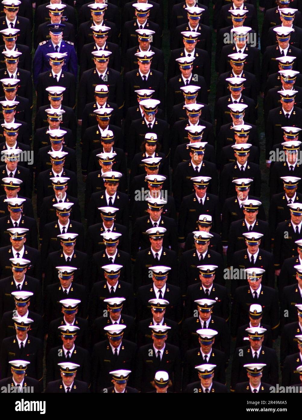 US Navy The U.S. Naval Academy Brigade of Midshipmen marches onto the ...