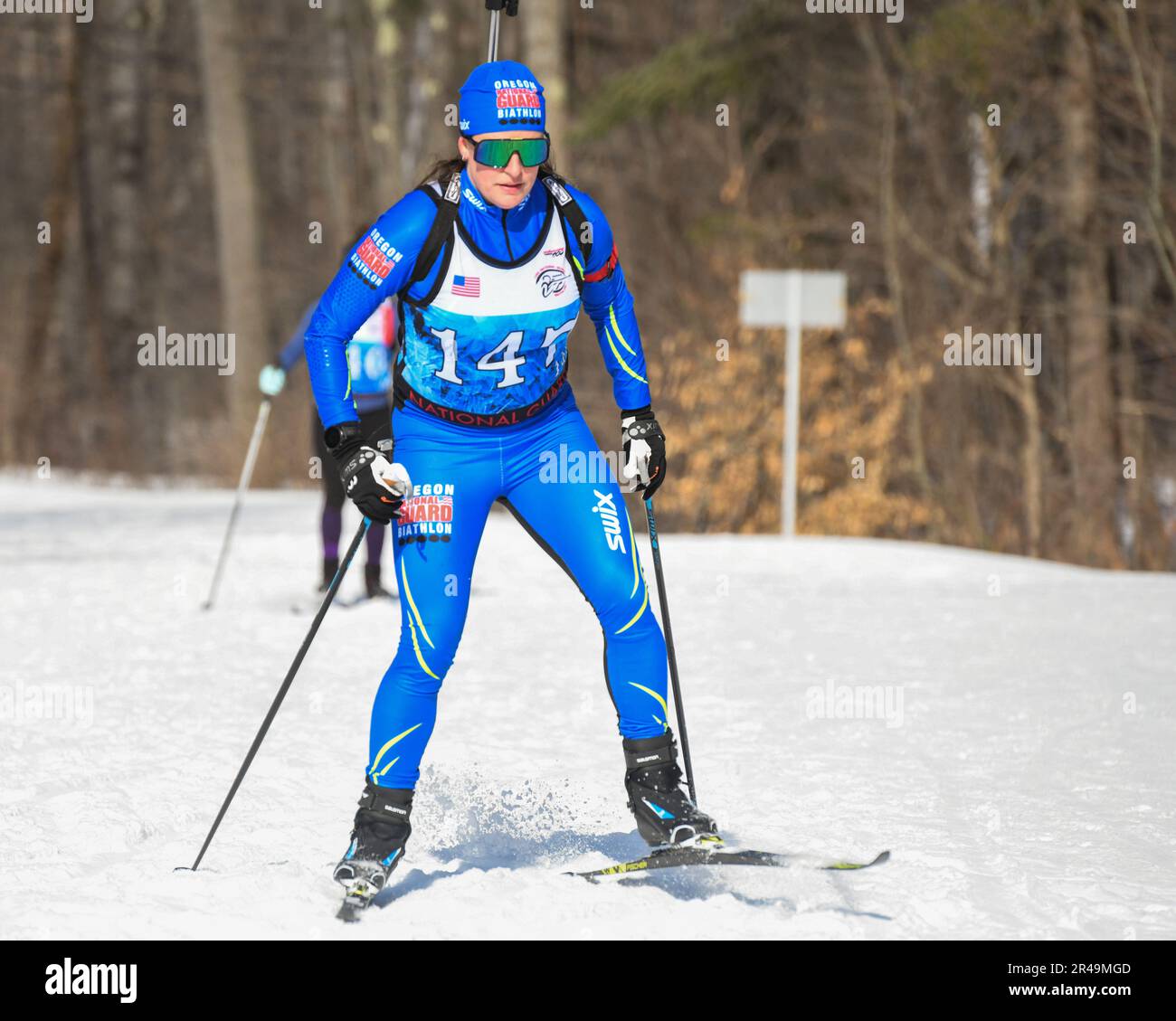 Oregon Army National Guard Maj. Kristy Harrison summits a hill during ...